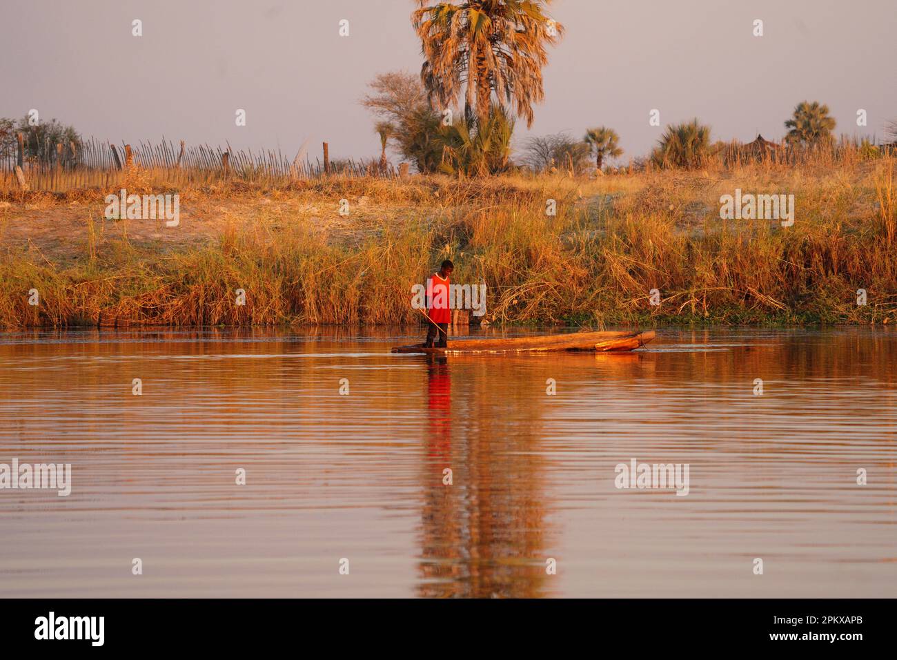 Young Boy fishing on the Zambezi River Stock Photo - Alamy