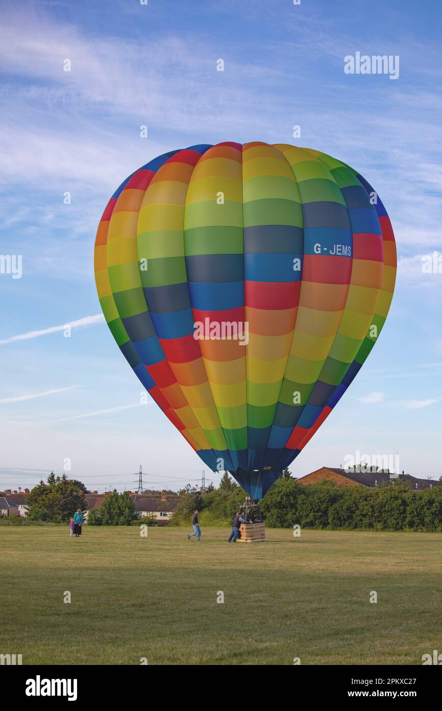 A hot air balloon lands in a park in the suburbs of east London after ...
