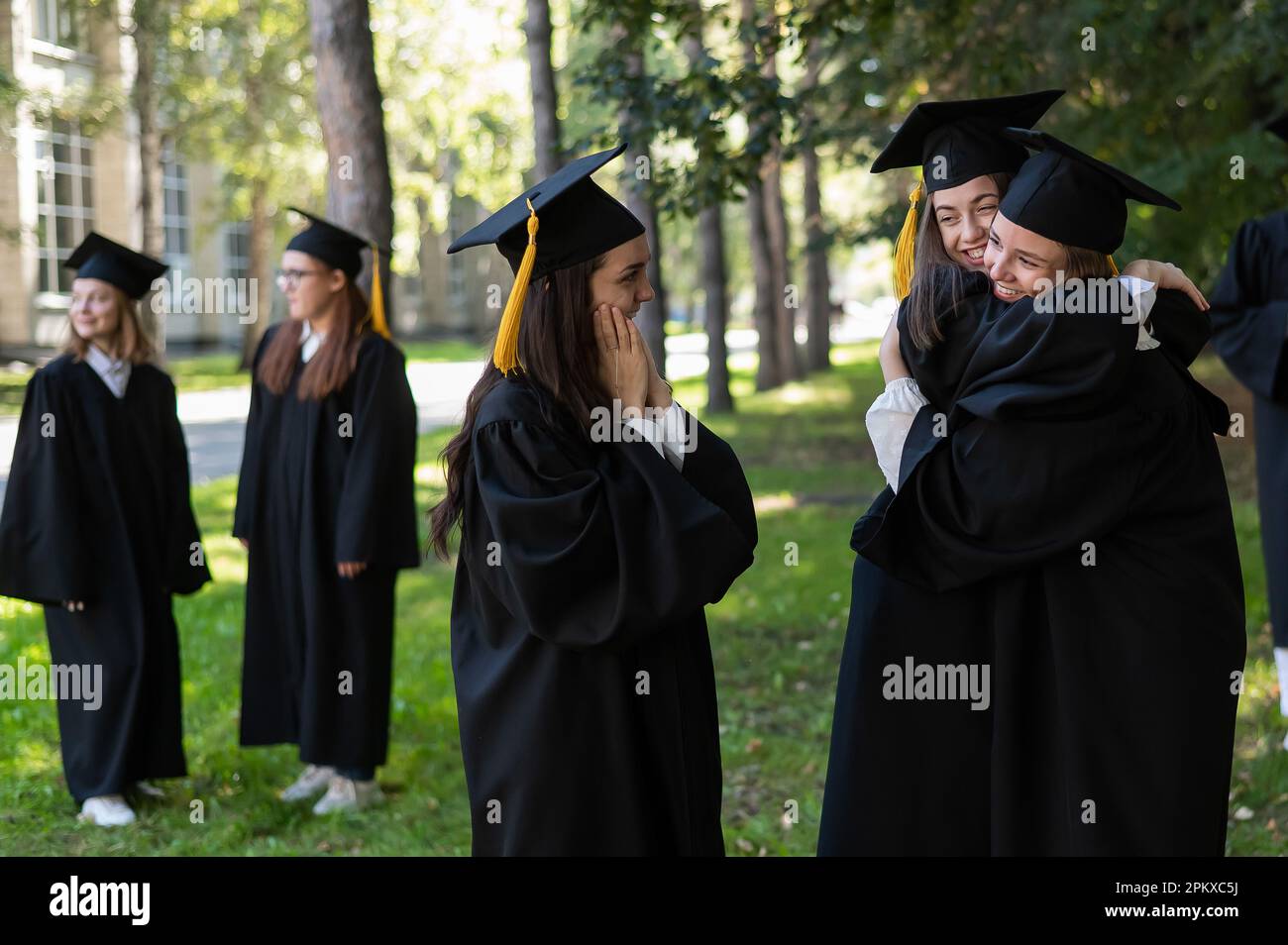 Two graduation hats hi-res stock photography and images - Alamy