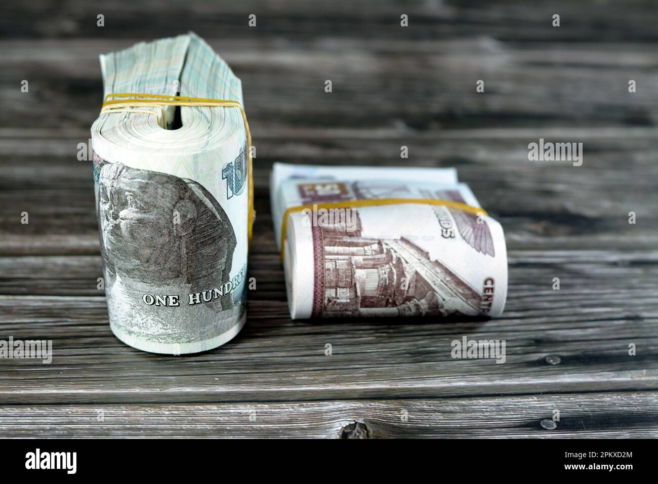 Egypt money folded bundles banknote bills of 100 and 50 EGP LE one ... Egypt money folded bundles banknote bills of 100 and 50 EGP LE one ...