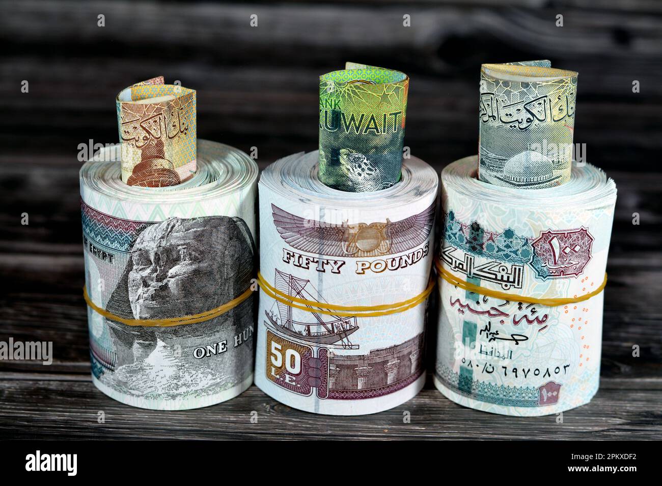 Rolls of Egypt money banknote bills of 100 and 50 EGP LE one hundred ...