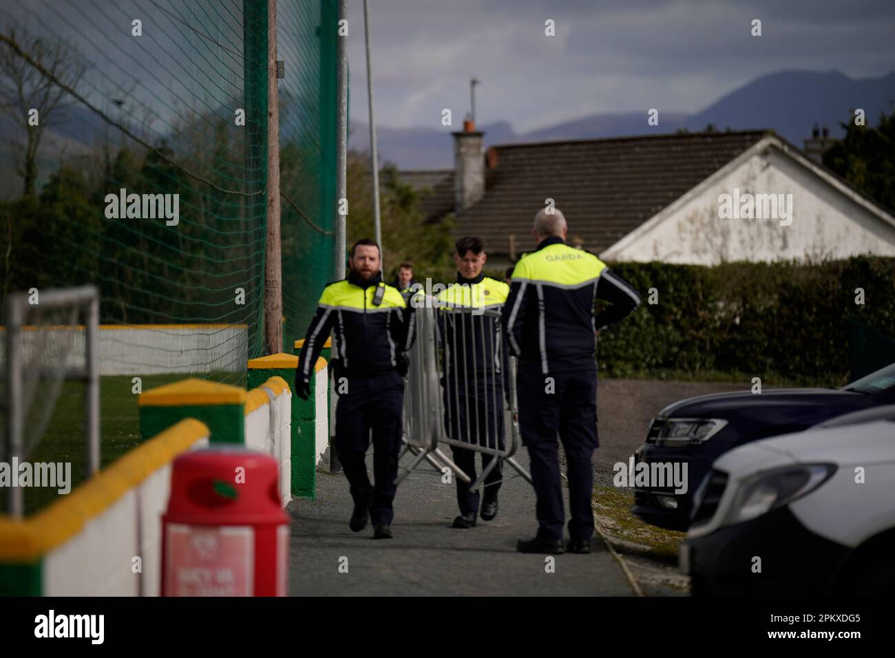 A Garda security cordon is put into place at Cooley Kickhams GAA Club ...