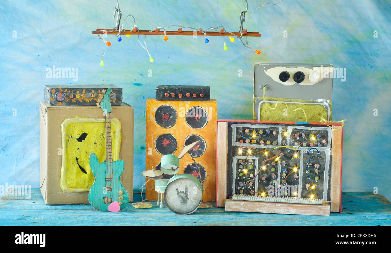 Grungy cardboard models of synthesizer,drum kit,guitar,amplifiers on ...