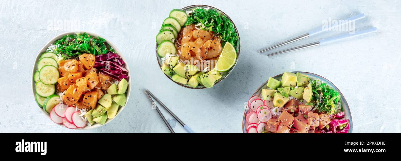 Poke bowl, healthy Hawaiian dish, panorama. Plates with salmon, tuna ...