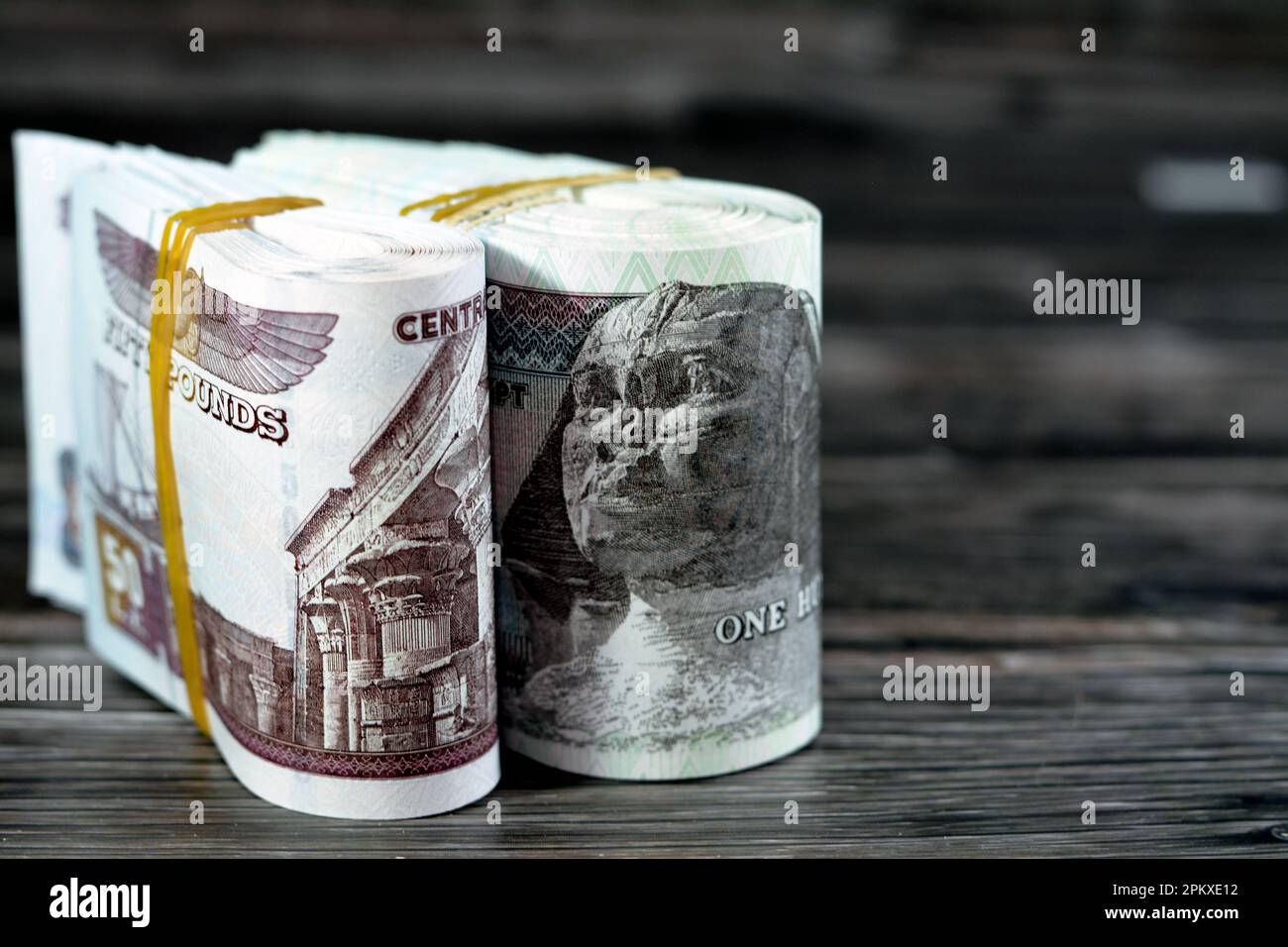 Egypt money folded bundles banknote bills of 100 and 50 EGP LE one ... Egypt money folded bundles banknote bills of 100 and 50 EGP LE one ...