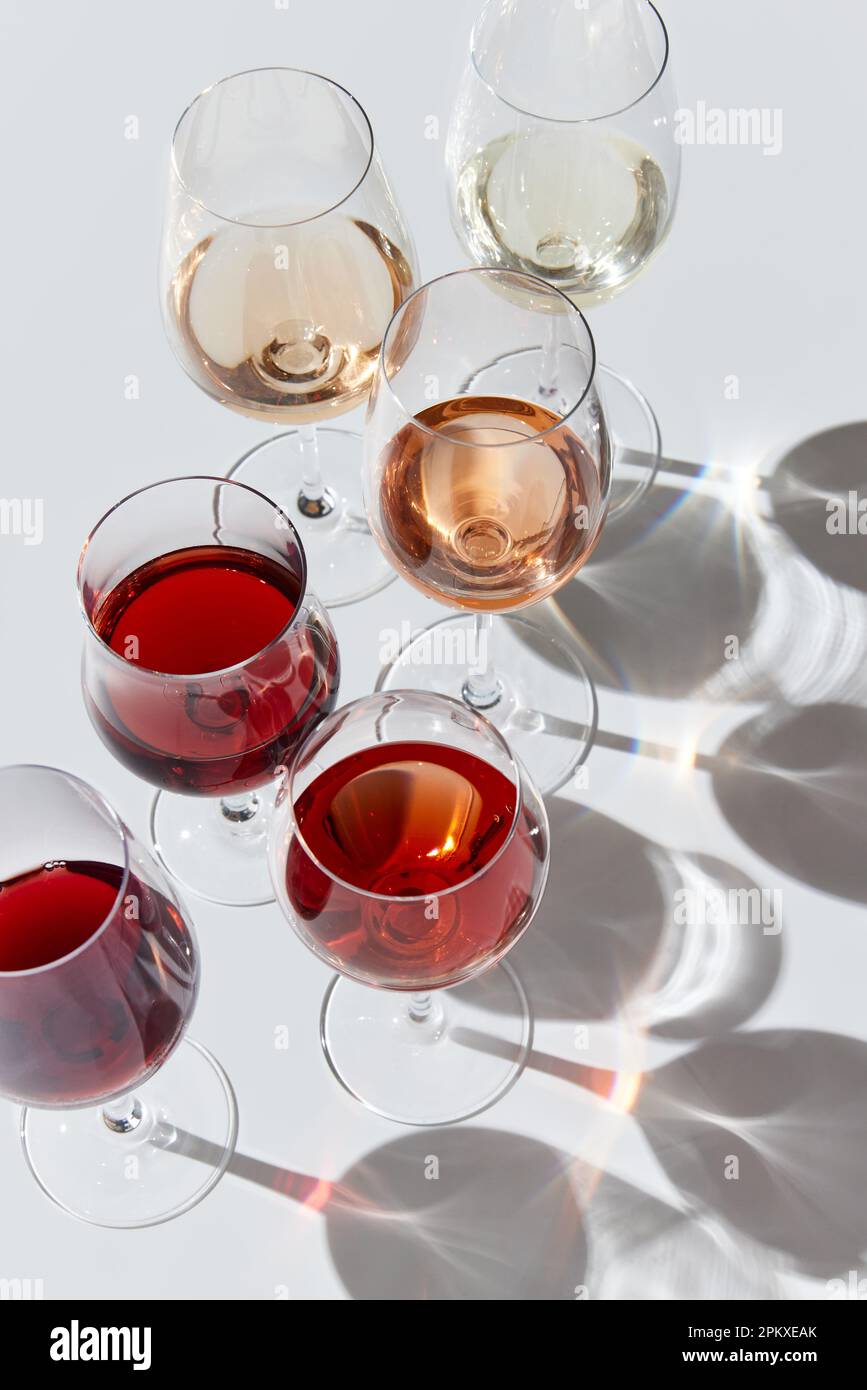 Traditional taste. Glasses filled with different white, rose and red ...