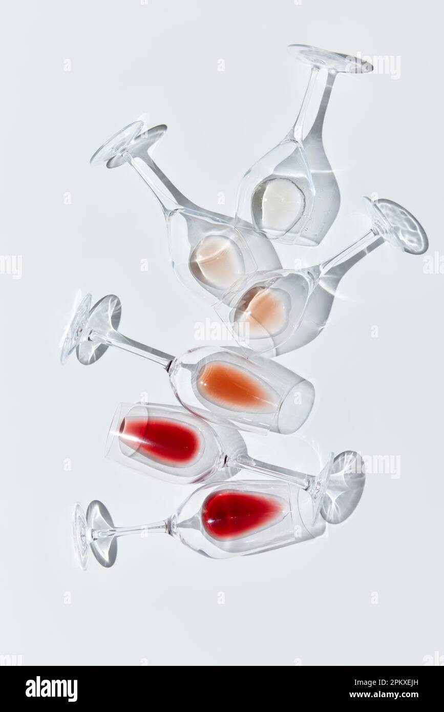 Art of traditional wine taste. Glasses with drops of different red ...