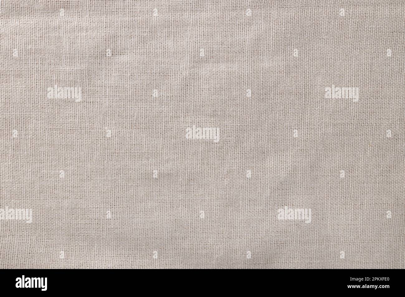 Closeup of rough, crumpled burlap texture made of flaxen textile ...