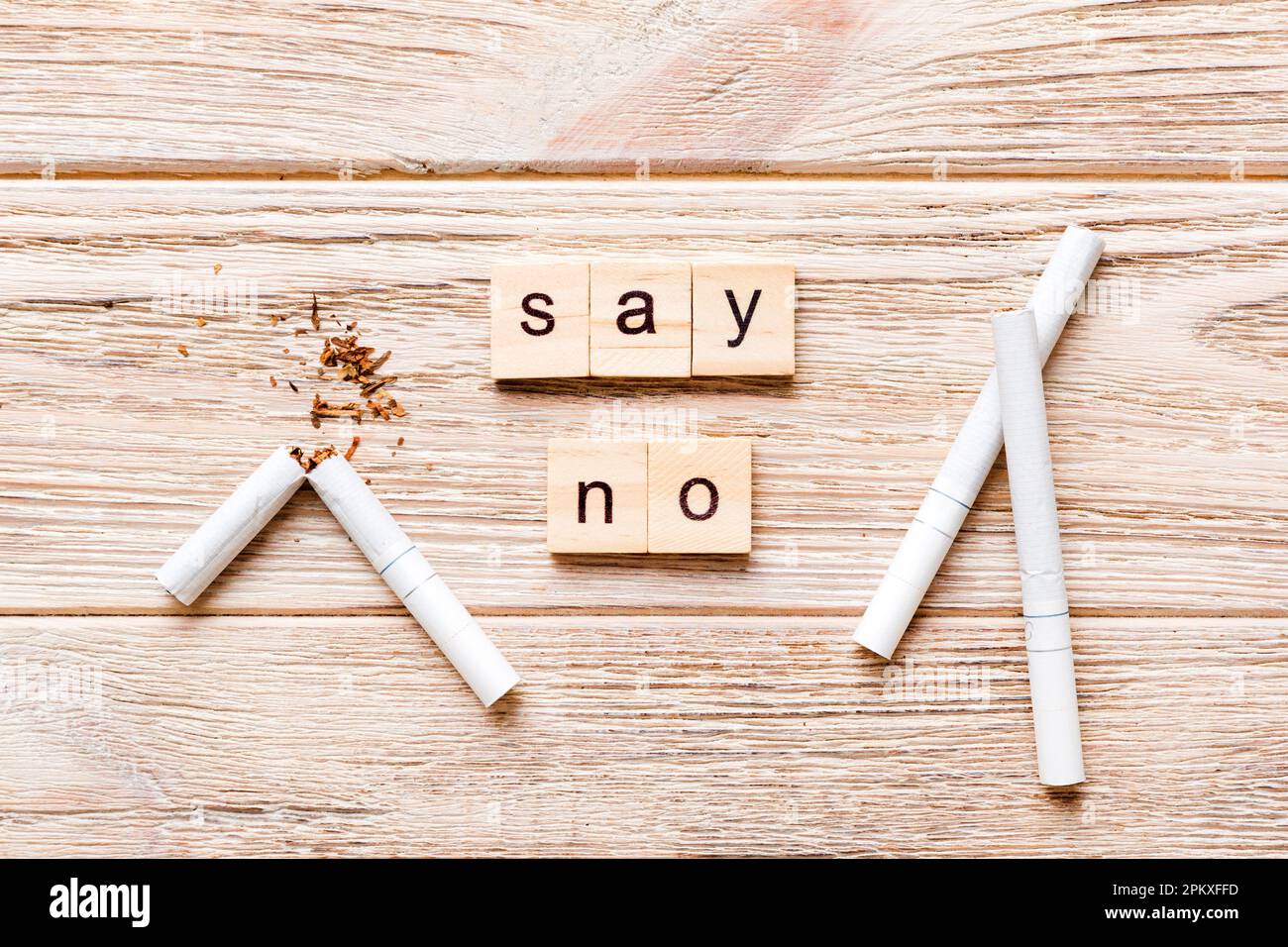 Cigarette And Wooden Blocks, Broken cigarette on table background, No ...