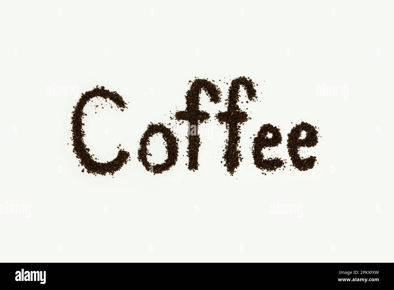 The word coffee spelled with coffee grounds Stock Photo - Alamy