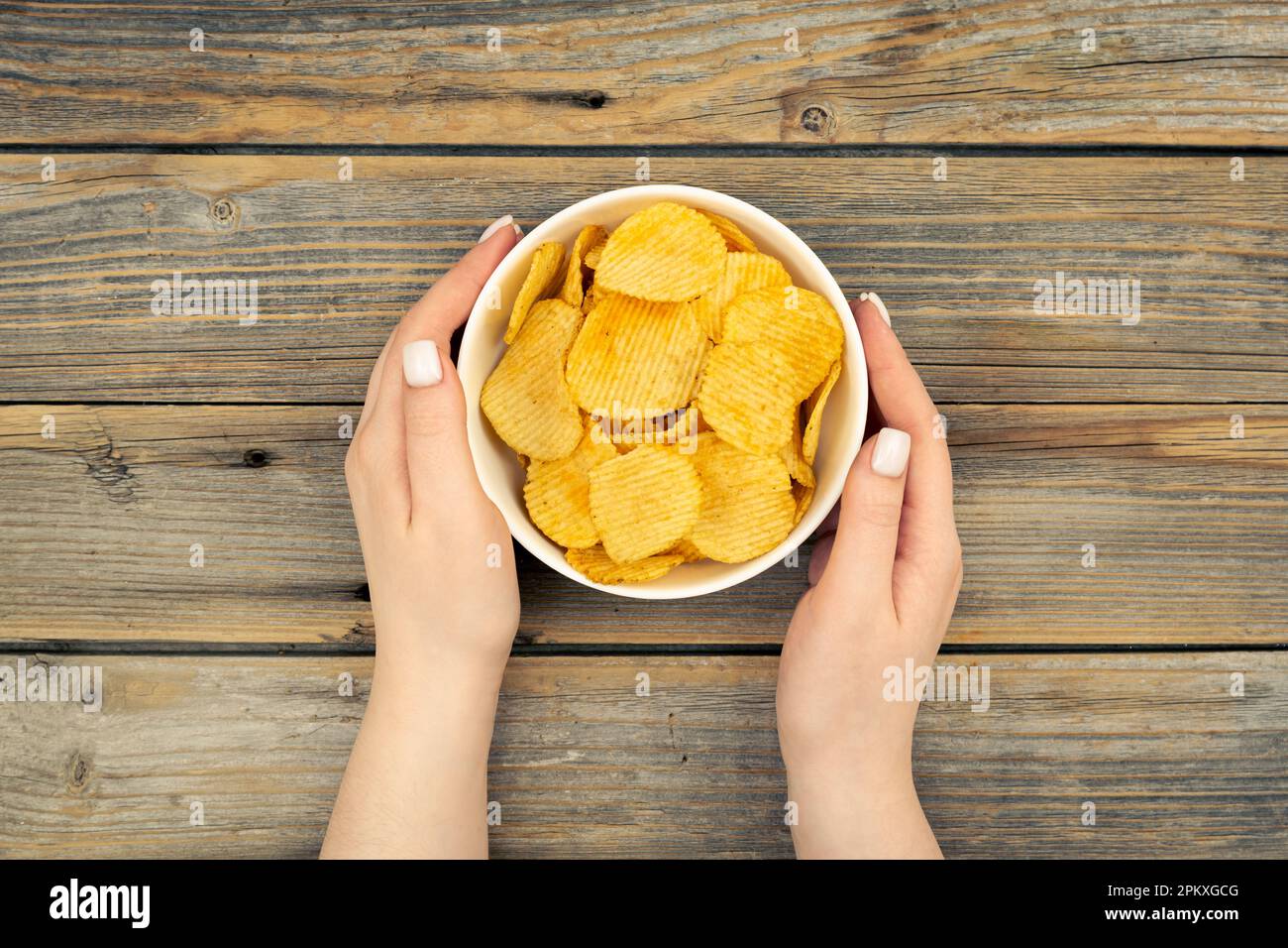 Woman eating plate baked potato hi-res stock photography and images - Alamy
