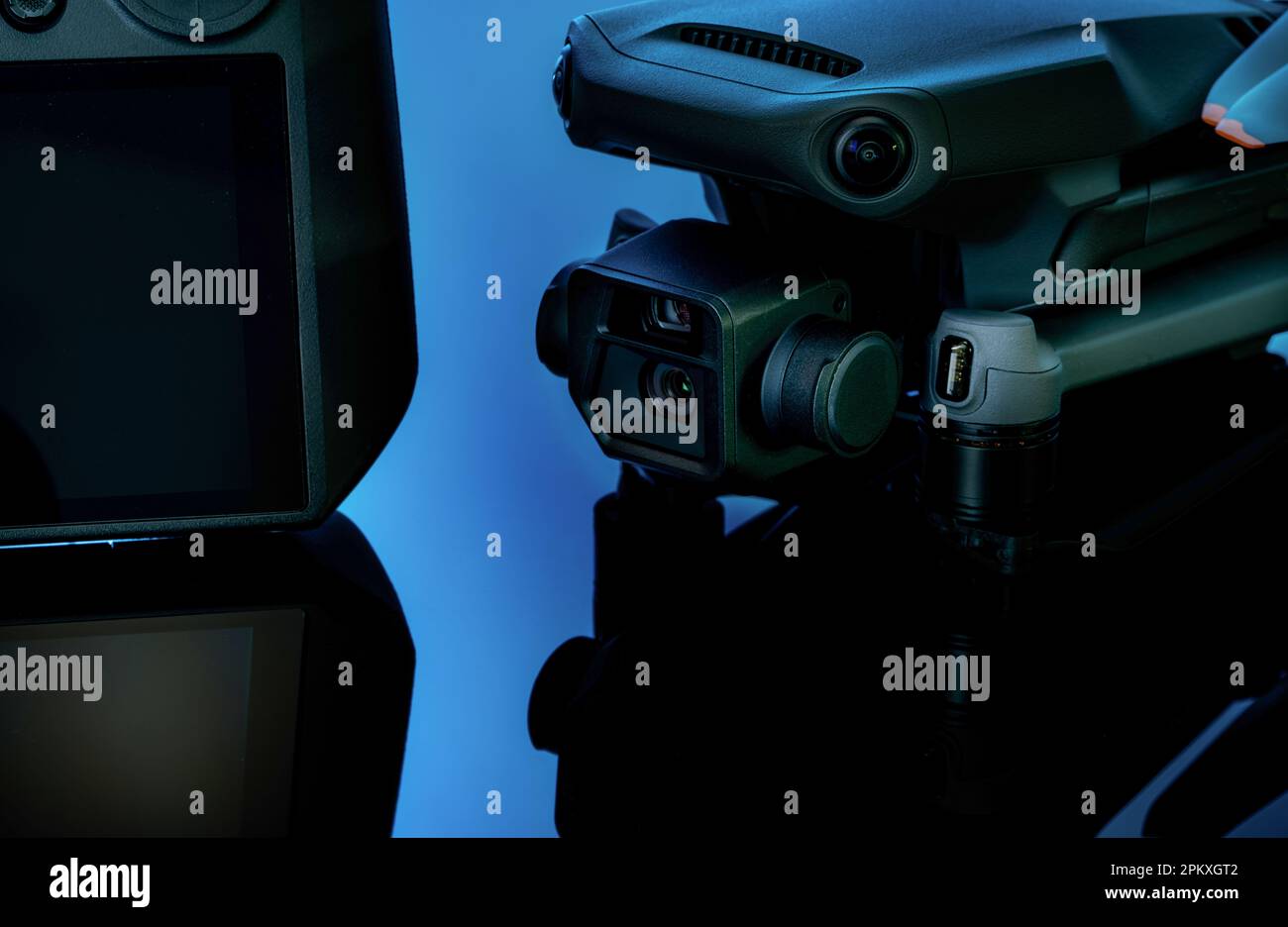 Drone and remote controller. UAV or unmanned aerial vehicle. Quadcopter ...