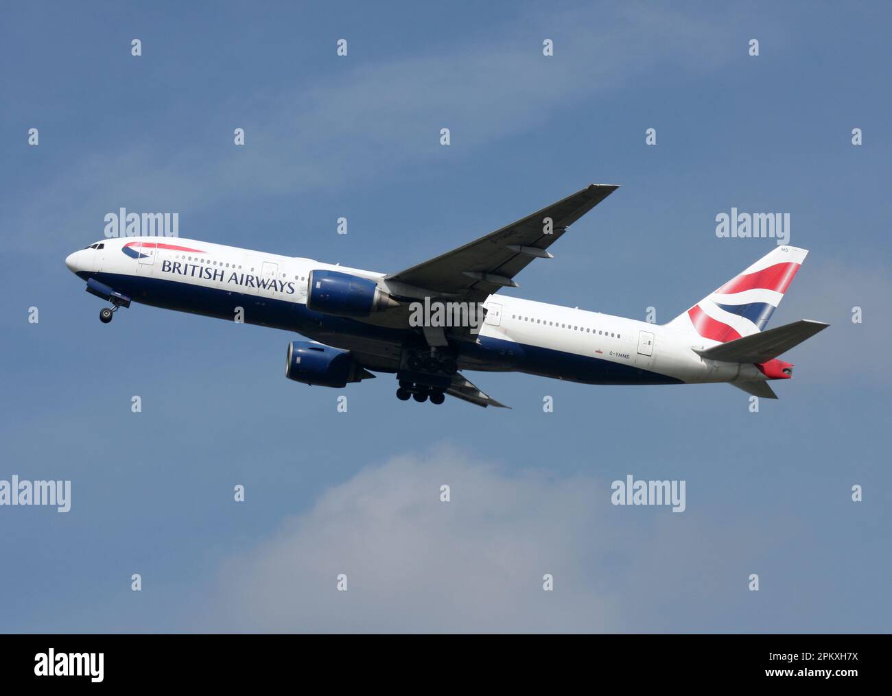 A Boeing 777-200 of British Airways departs London Gatwick Airport ...