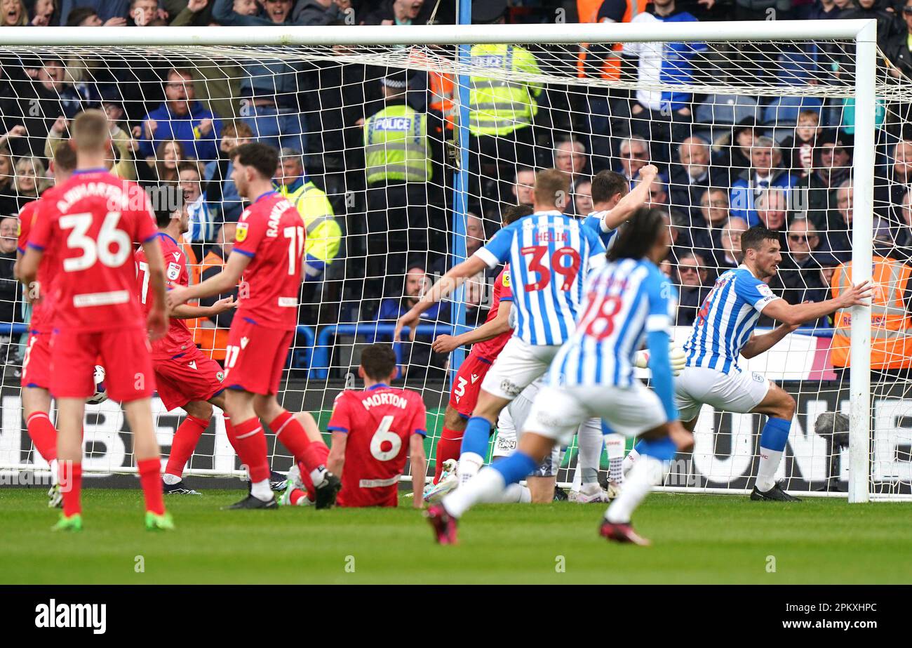 Huddersfield Town's Matty Pearson (right) celebrates scoring their side ...
