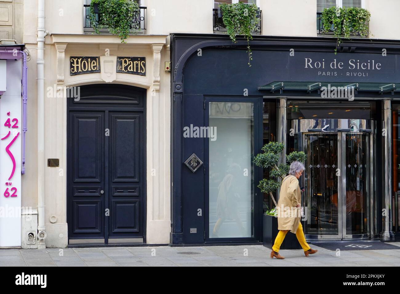 Woman passing front facade, Roi de Sicile - Rivoli, Hotel Paris, luxury ...