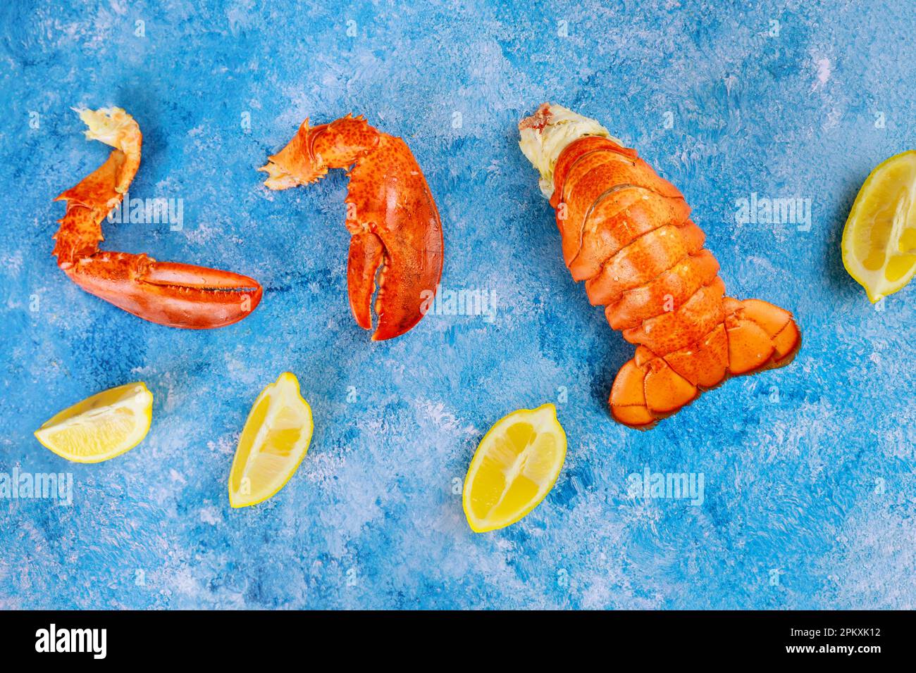 On table, gourmet freshly cooked lobster with lemon is one of most ...
