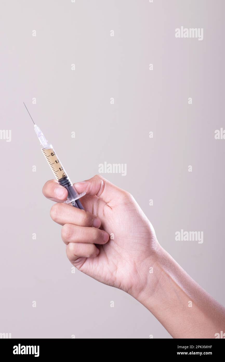 Drug injection in female hand Stock Photo - Alamy