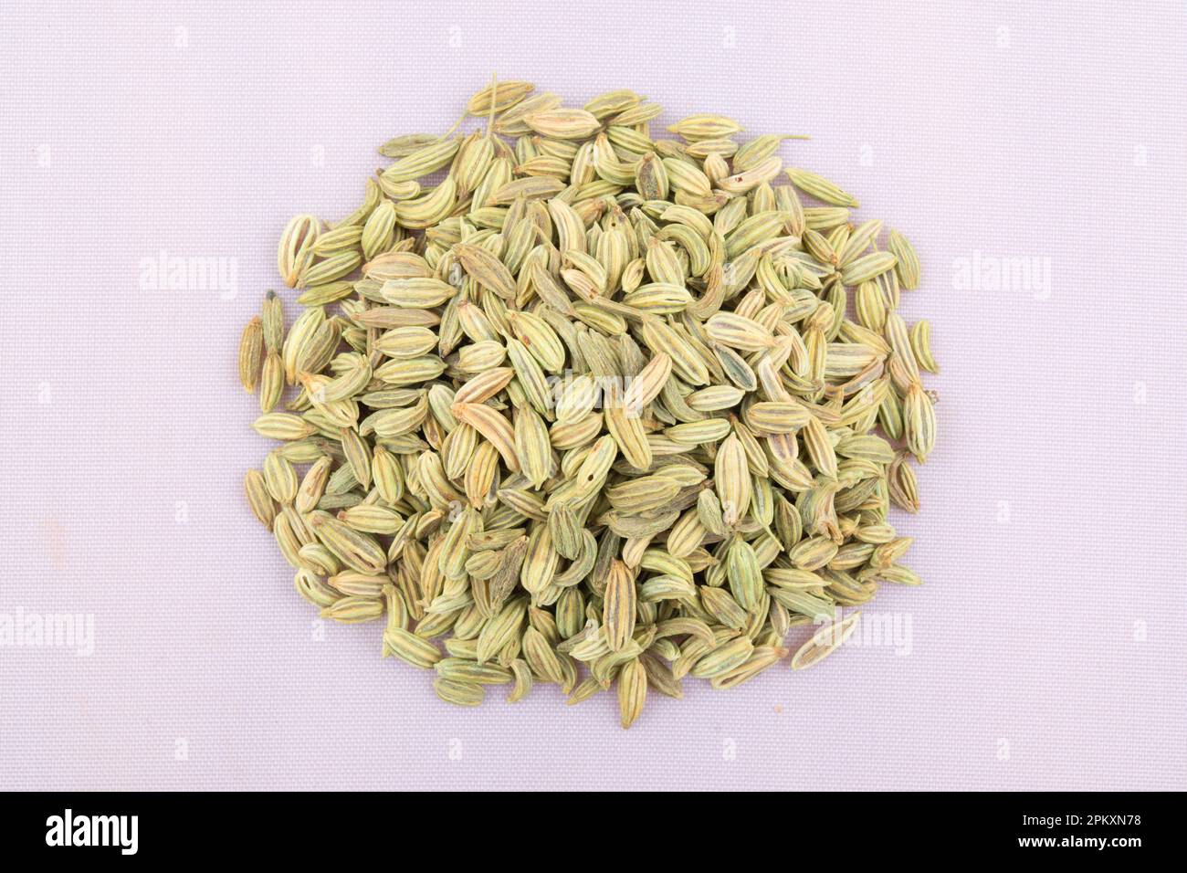Fennel seeds top view on white background Stock Photo - Alamy