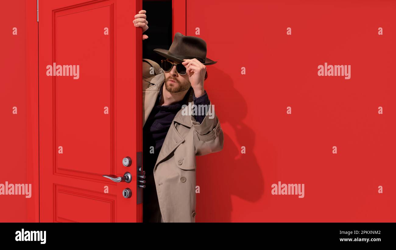 Stylish bearded man in trench coat and glasses, detective peeking out ...