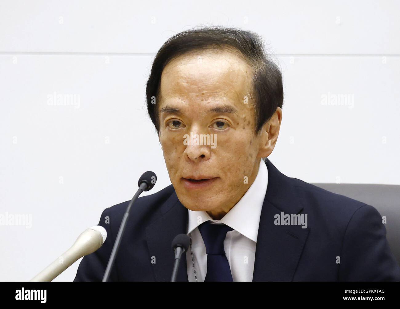 New Bank of Japan Governor Kazuo Ueda attends his first press ...