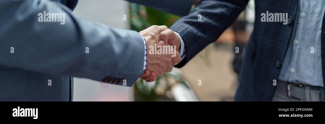 Business male partnership handshake. Photo handshaking process ...