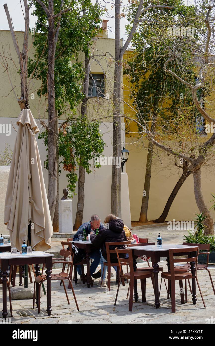locals enjoying lunch in a square in Athens in Spring Stock Photo - Alamy