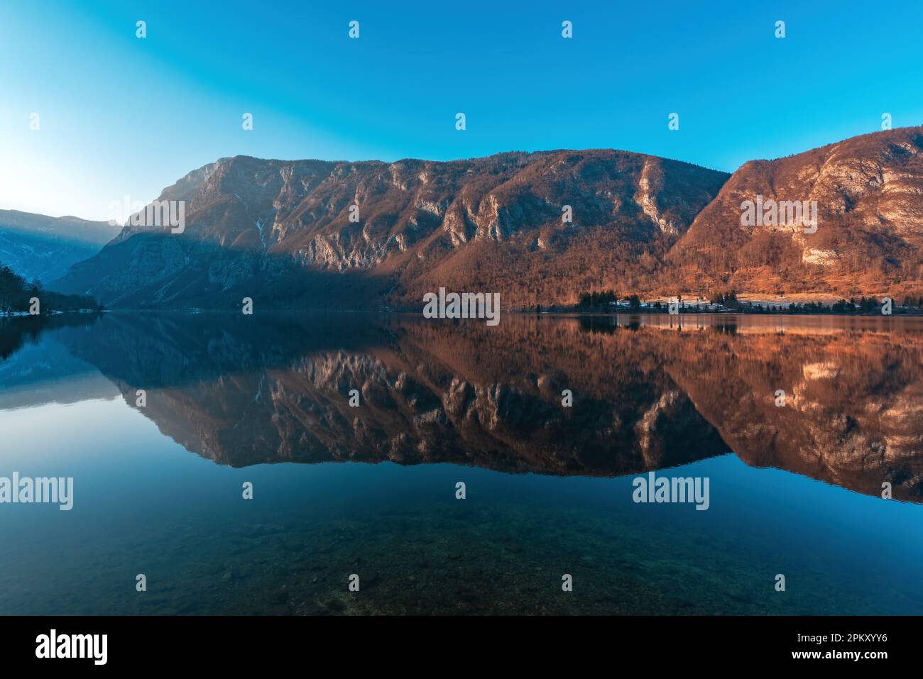 Mountain Vogar in slovenian national park Triglav reflecting its peak ...