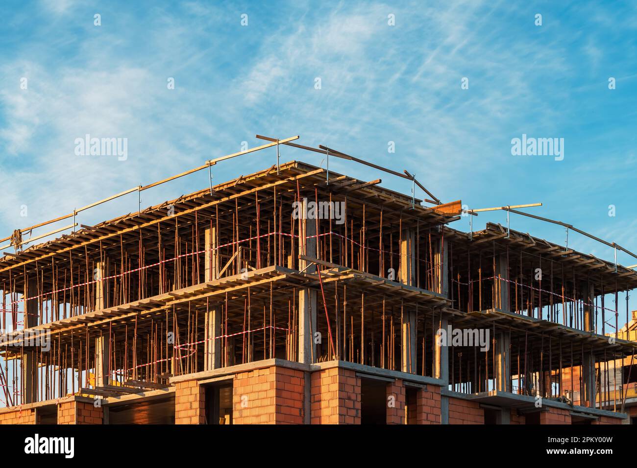 Scaffolding holding the concrete pillars framework of building ...