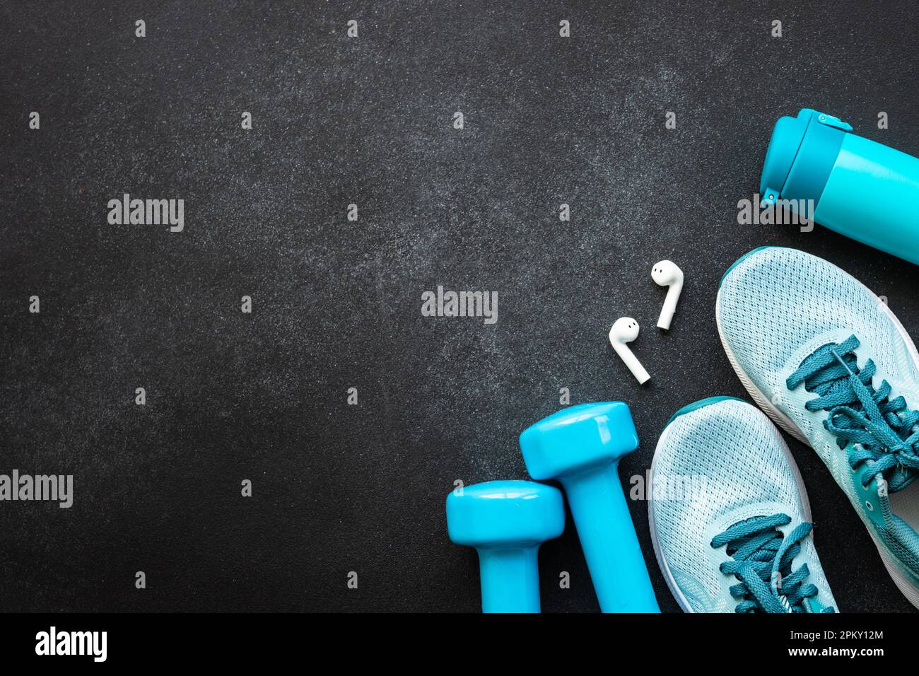 Fitness equipment at black background top view Stock Photo - Alamy