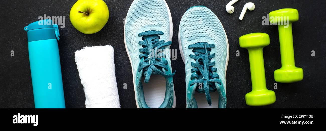 Fitness equipment at black background top view Stock Photo - Alamy
