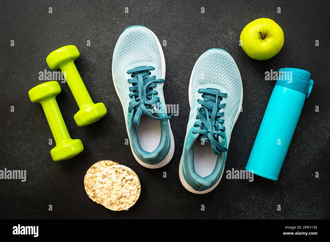 Fitness equipment at black background top view Stock Photo - Alamy