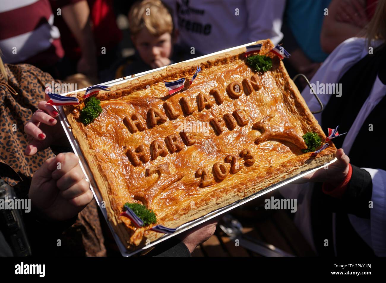 The Hallaton hare pie is shown to the crowd before the annual game of ...