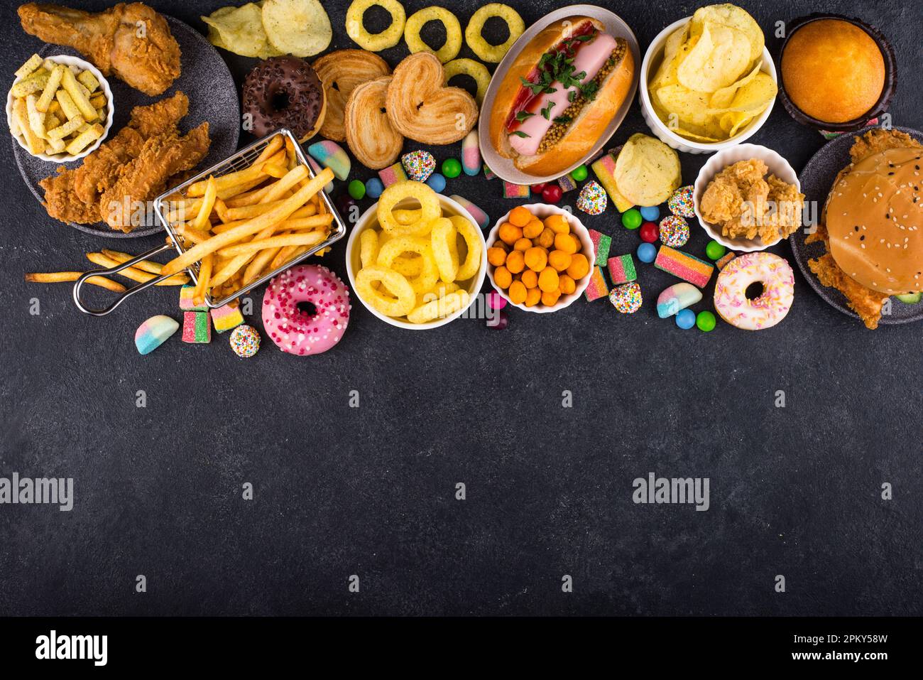 Assortment of various unhealthy junk food Stock Photo - Alamy