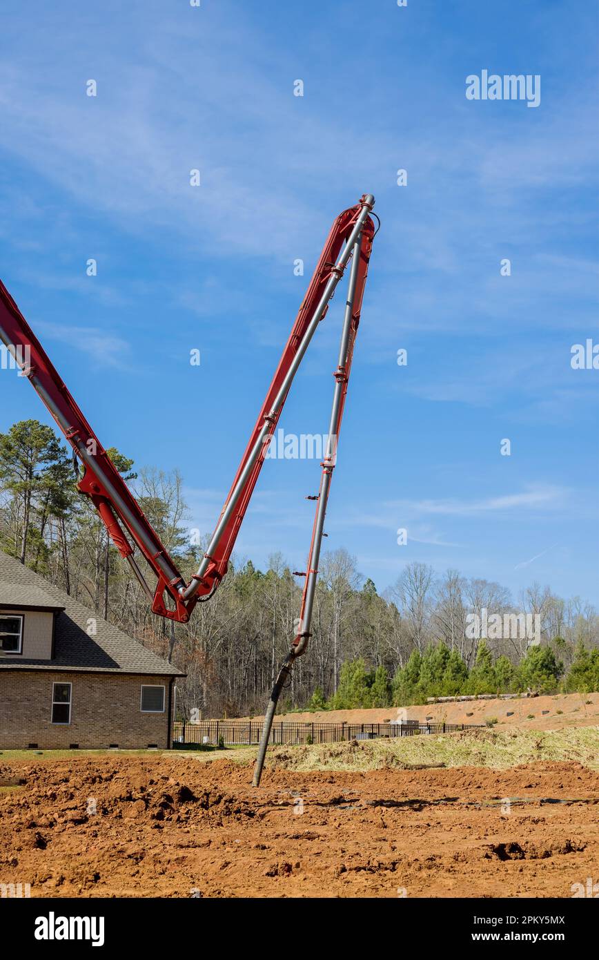 Pouring cement concrete automatic pump hi-res stock photography and ...