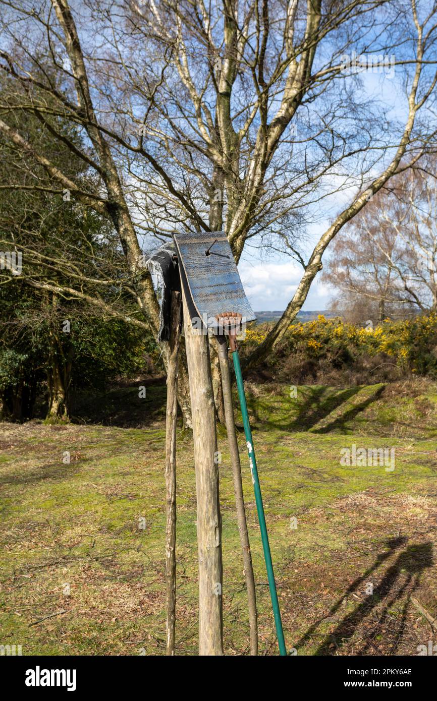 Fire beaters hanging up at Old Lodge Nature Reserve, Sussex, UK. Fire ...