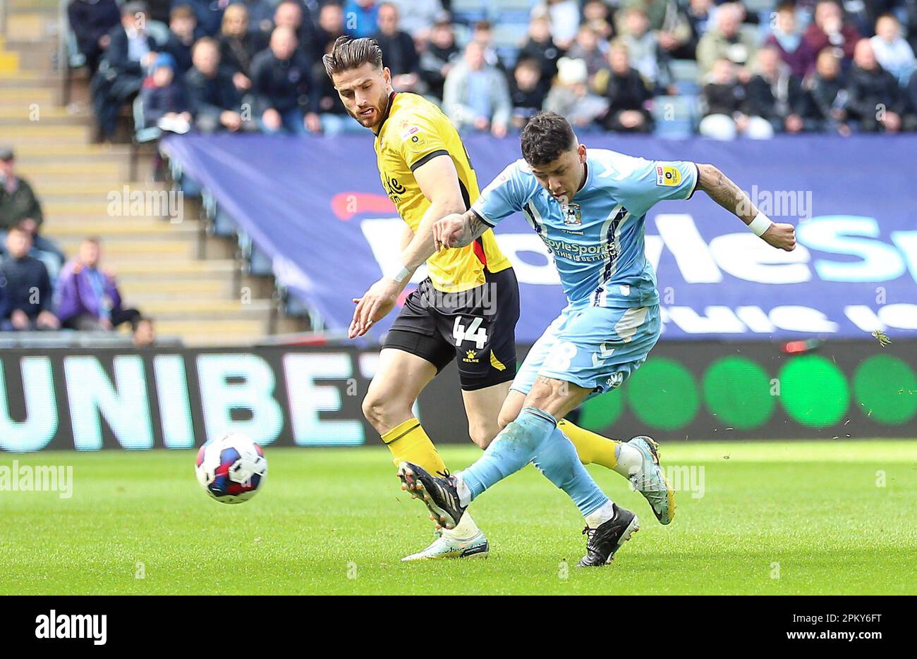 Coventry City's Gustavo Hamer (right) attempts a shot on goal as ...