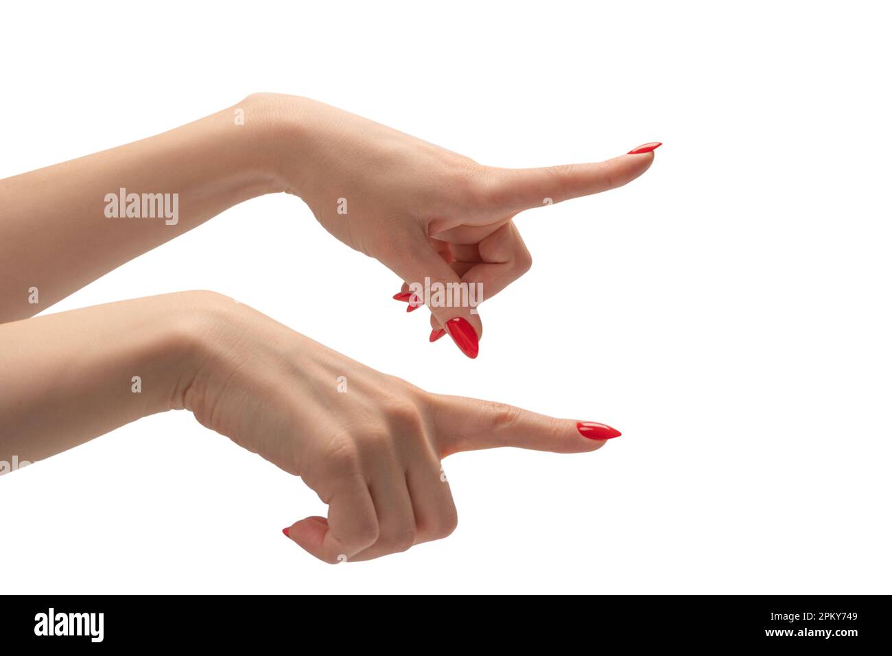 Closeup of female hand with pale skin and red nails pointing or ...