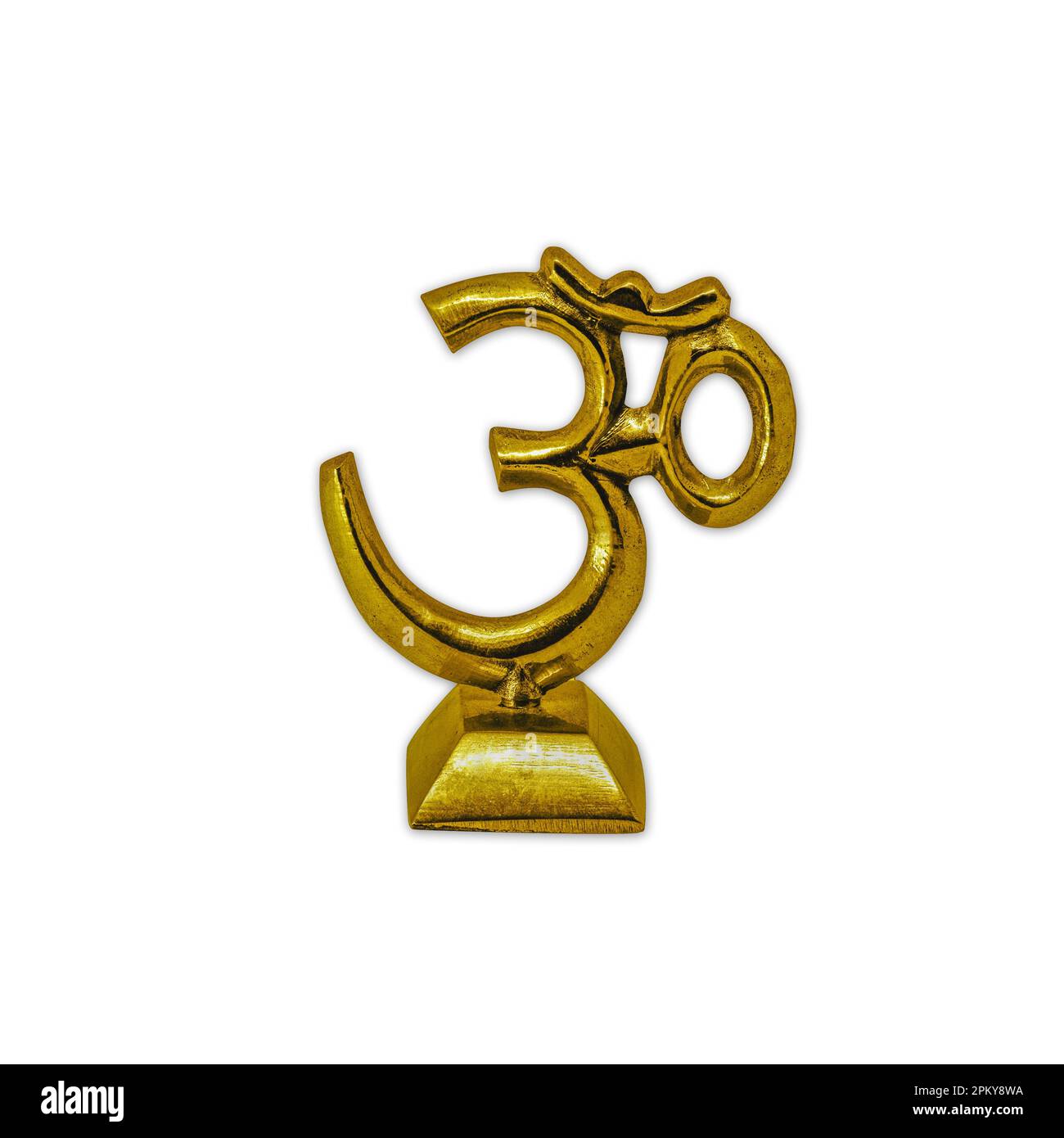 A polished solid brass om sign, with a small base, displayed on a white ...