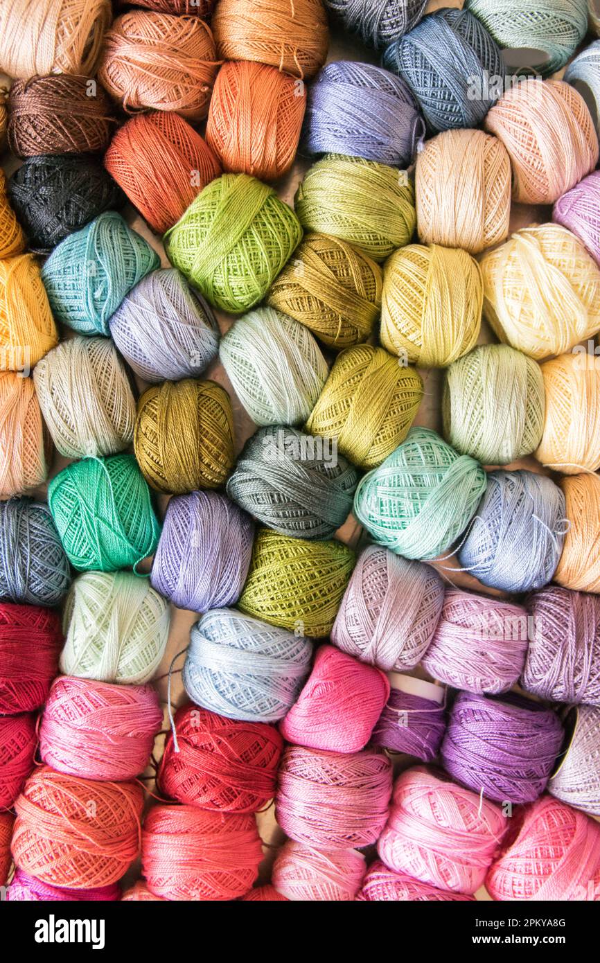 vertical photo of Colorful embroidery thread rolls made of cotton Stock ...