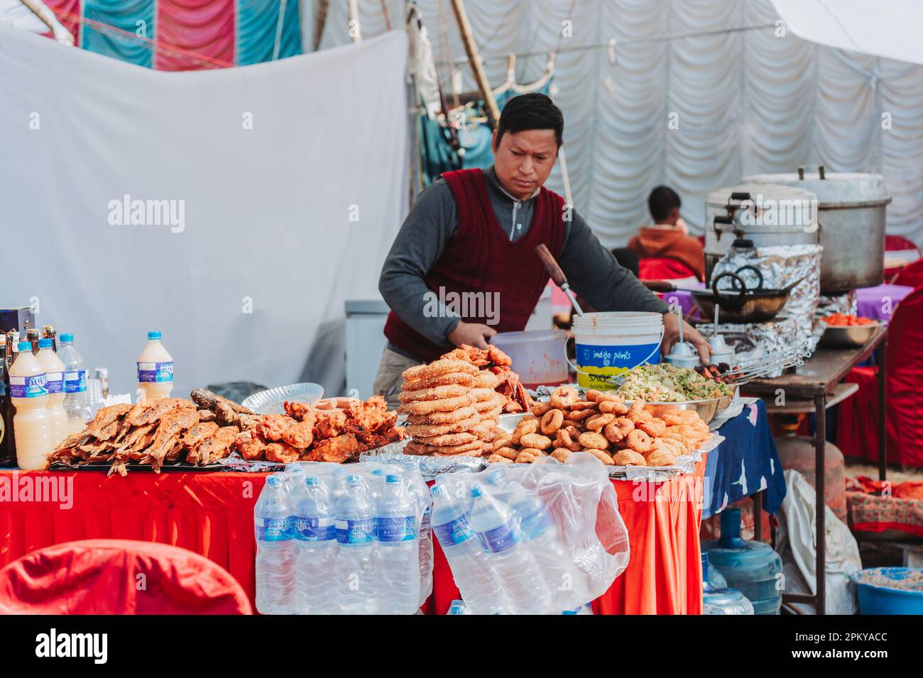 Kathmandu, Nepal - Jan 15, 2023 : Nepali Food Seller arranging foods ...