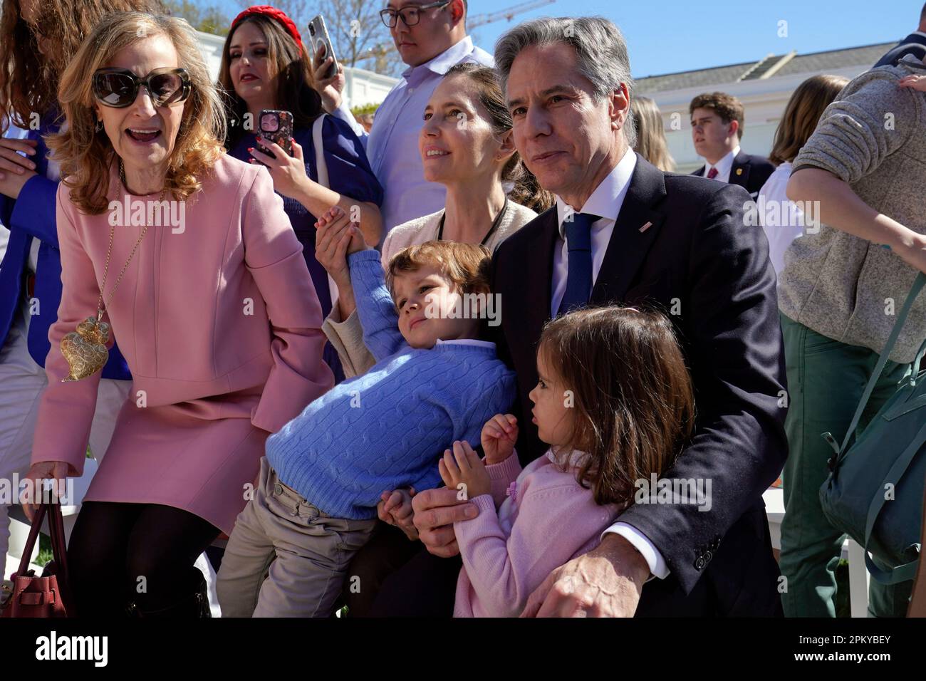 Secretary of State Antony Blinken sits with his children as they attend ...