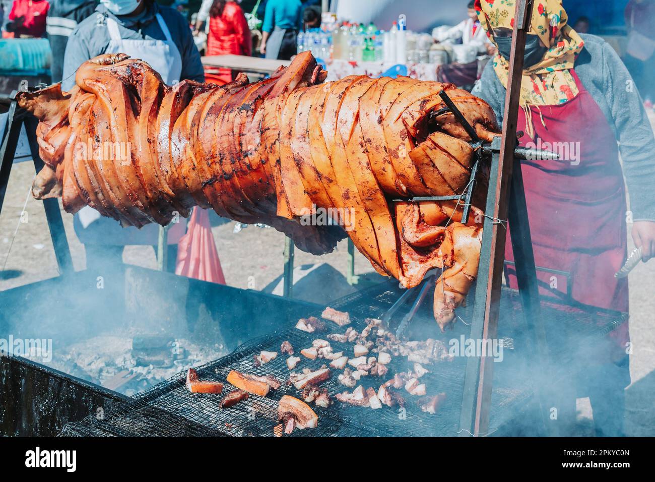 Whole Pork barbeque on a charcoal grill outdoor Stock Photo - Alamy