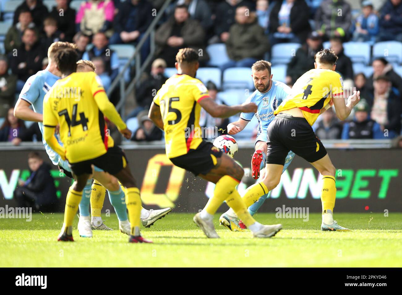 Coventry City's Matthew Godden (second right) scores their side's first ...