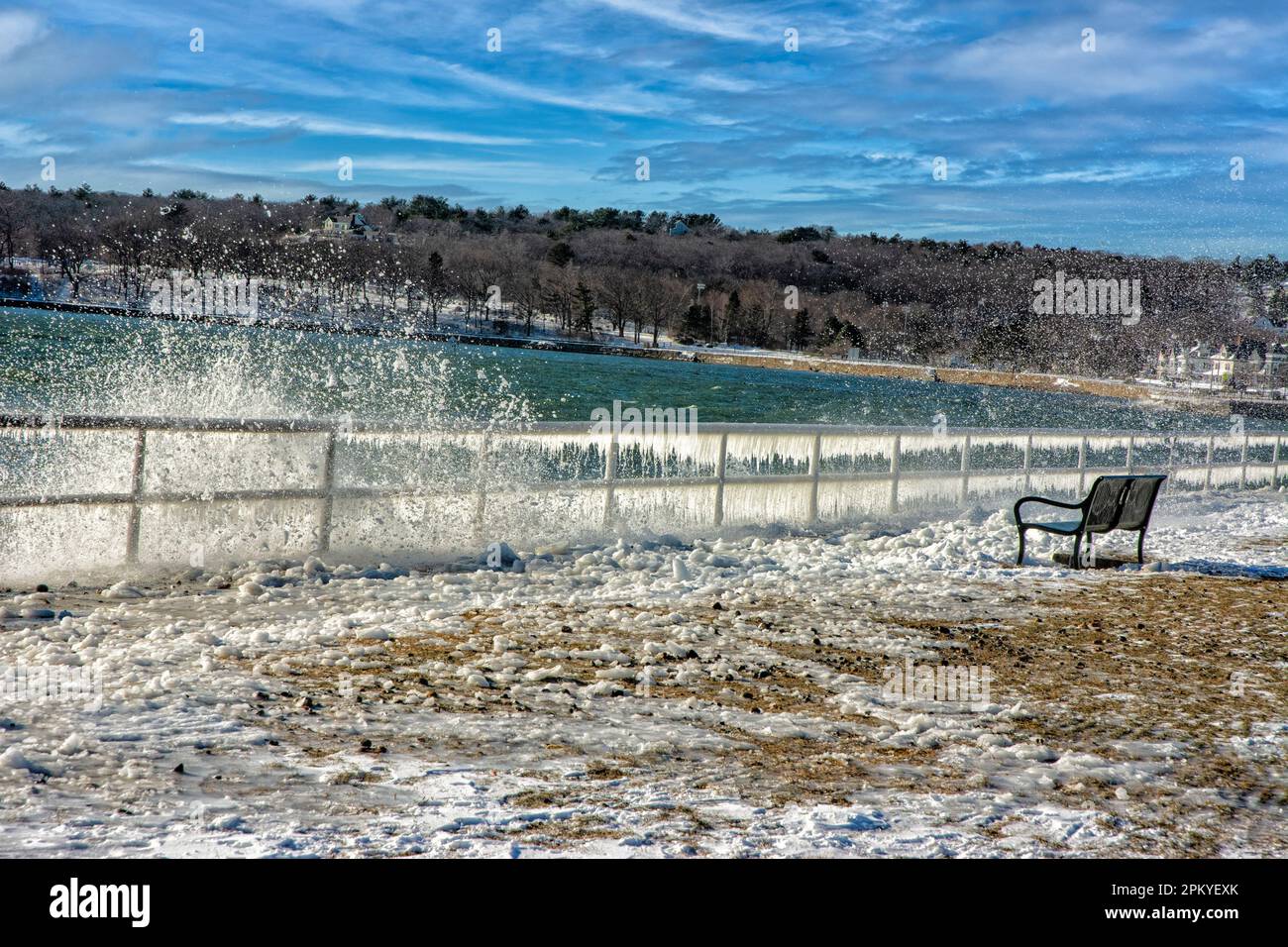 Winter surf at the ocean and ice crusted items Stock Photo - Alamy