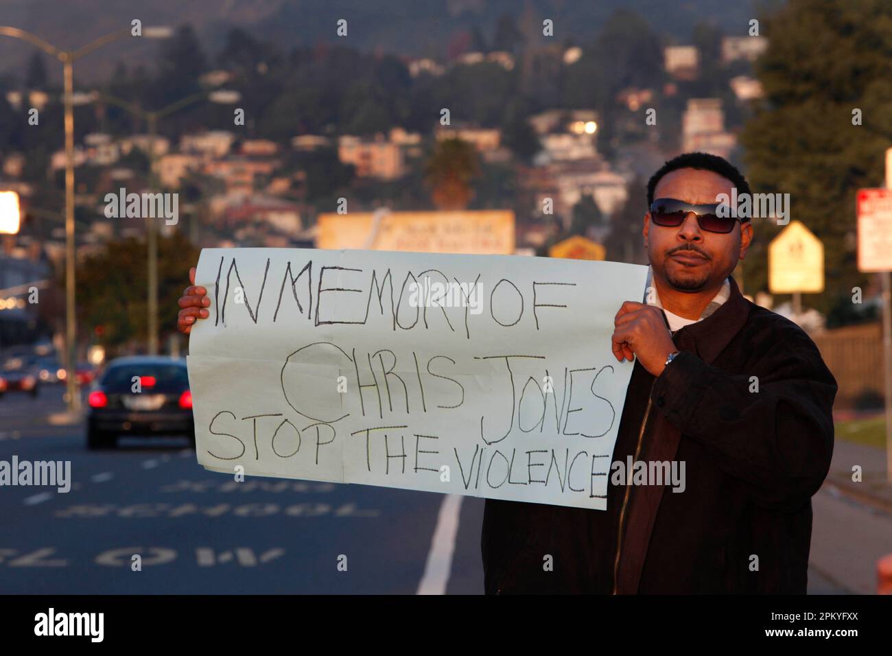 Mario Hankton, Oakland General Assembly Justice for Oscar Grant, holds ...