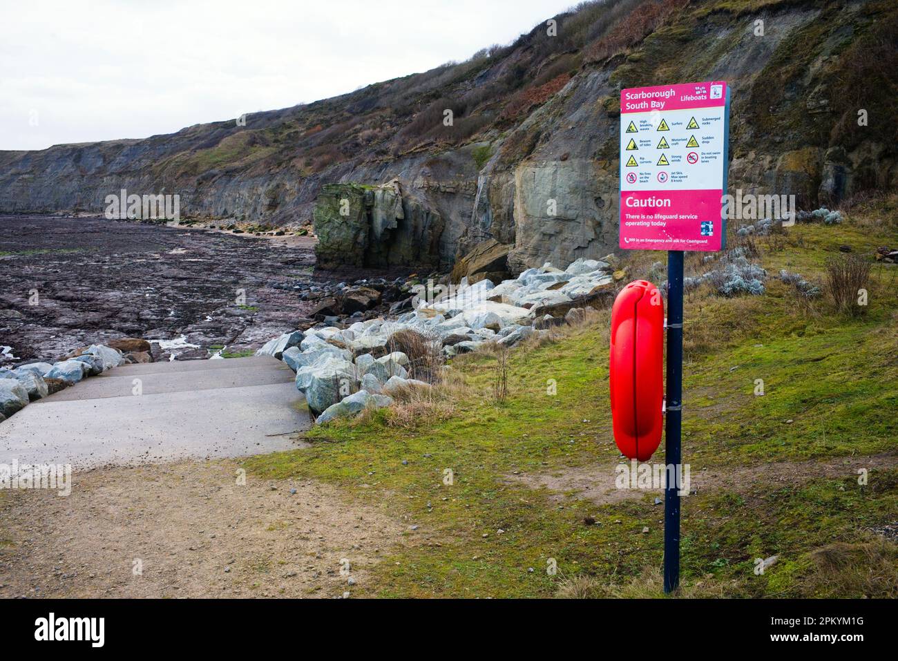 Slipway with Wheatcroft Cliff and the Black Rocks in the background ...