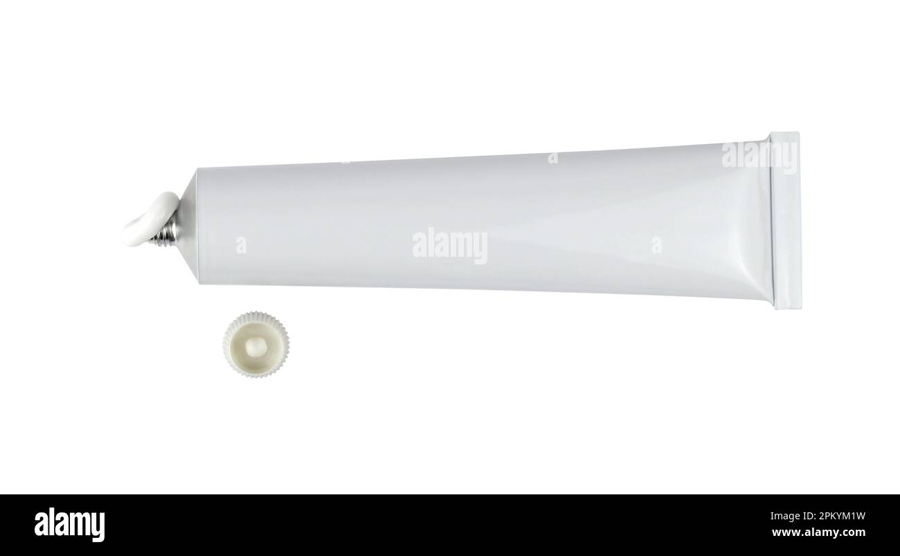 Open white medical or cosmetic cream tube with its lid isolated from ...