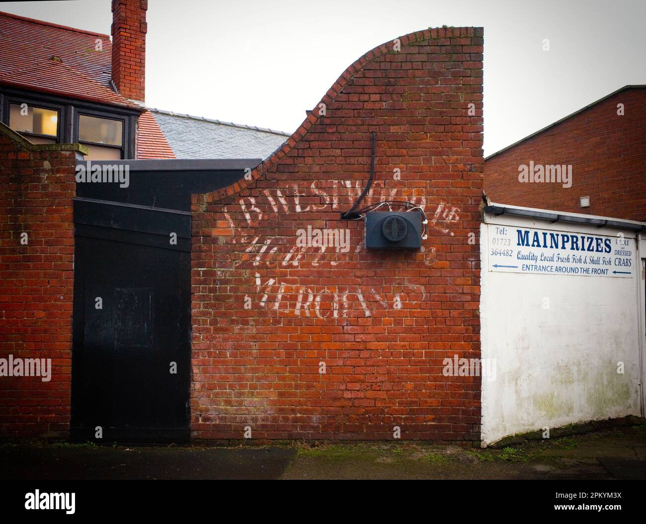 Hidden painted on brick walll sign in Scarborough Stock Photo - Alamy