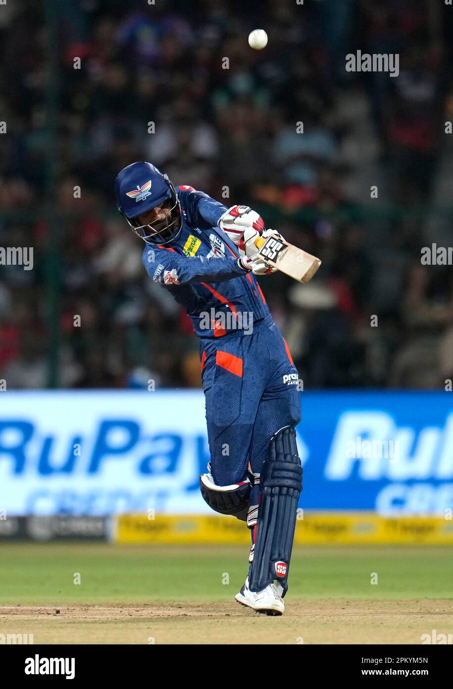 Lucknow Super Giants' Deepak Hooda plays a shot during the Indian Premier League cricket match ...