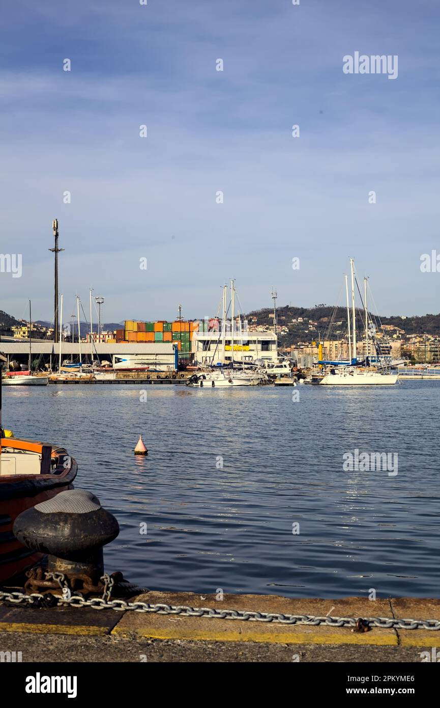 Freight yard and an industrial complex in a harbour at sunset seen from ...